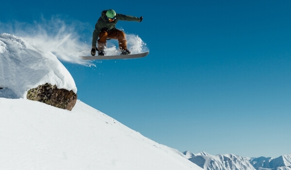 How to Jump on a Snowboard (The Basics + 3 Steps)